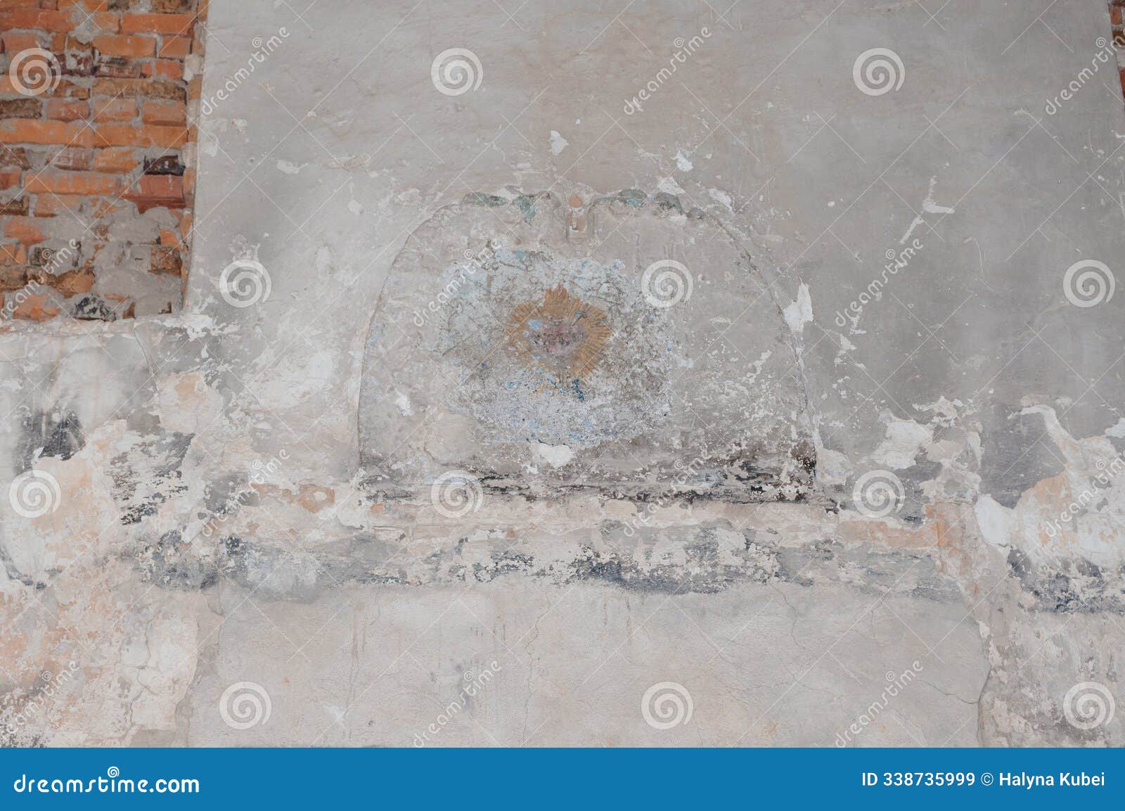 A Desolate Wall with Faded Historical Murals in an Abandoned Structure ...
