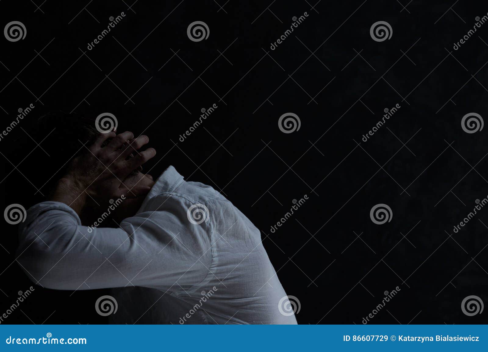Despair man in dark room stock image. Image of contrast - 86607729