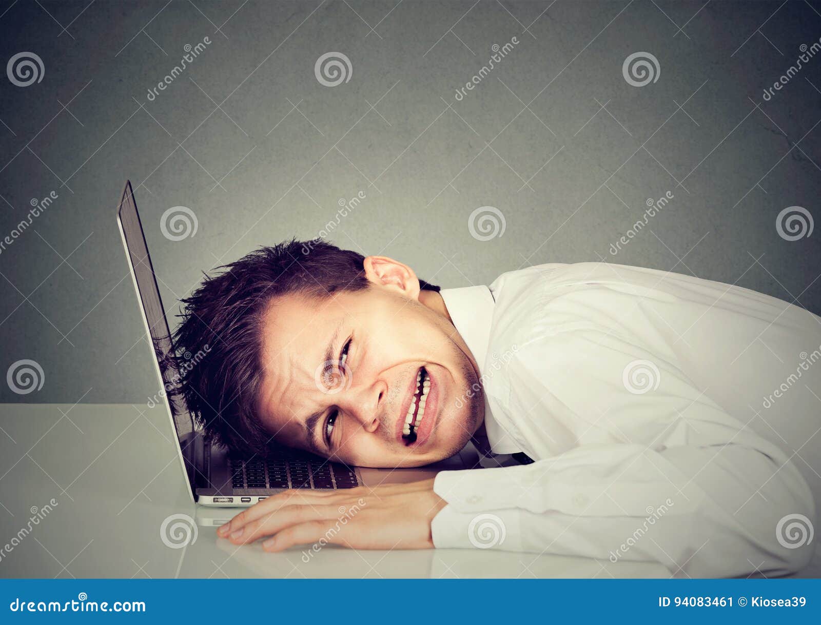 Desperate Business Man with Head on Laptop Keyboard Stock Image - Image ...