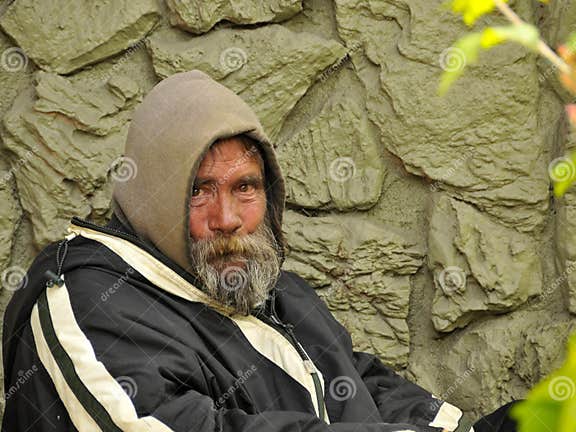 Desperate Homeless Man stock image. Image of pose, color - 13737621