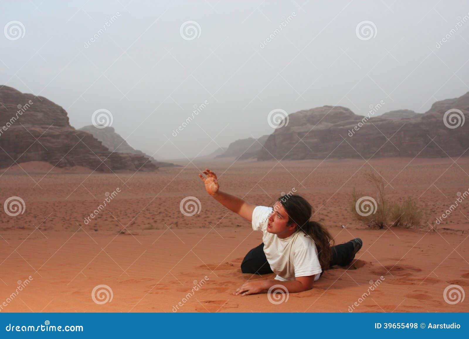 Desperate Man in the Desert Longing for Something Stock Photo - Image ...