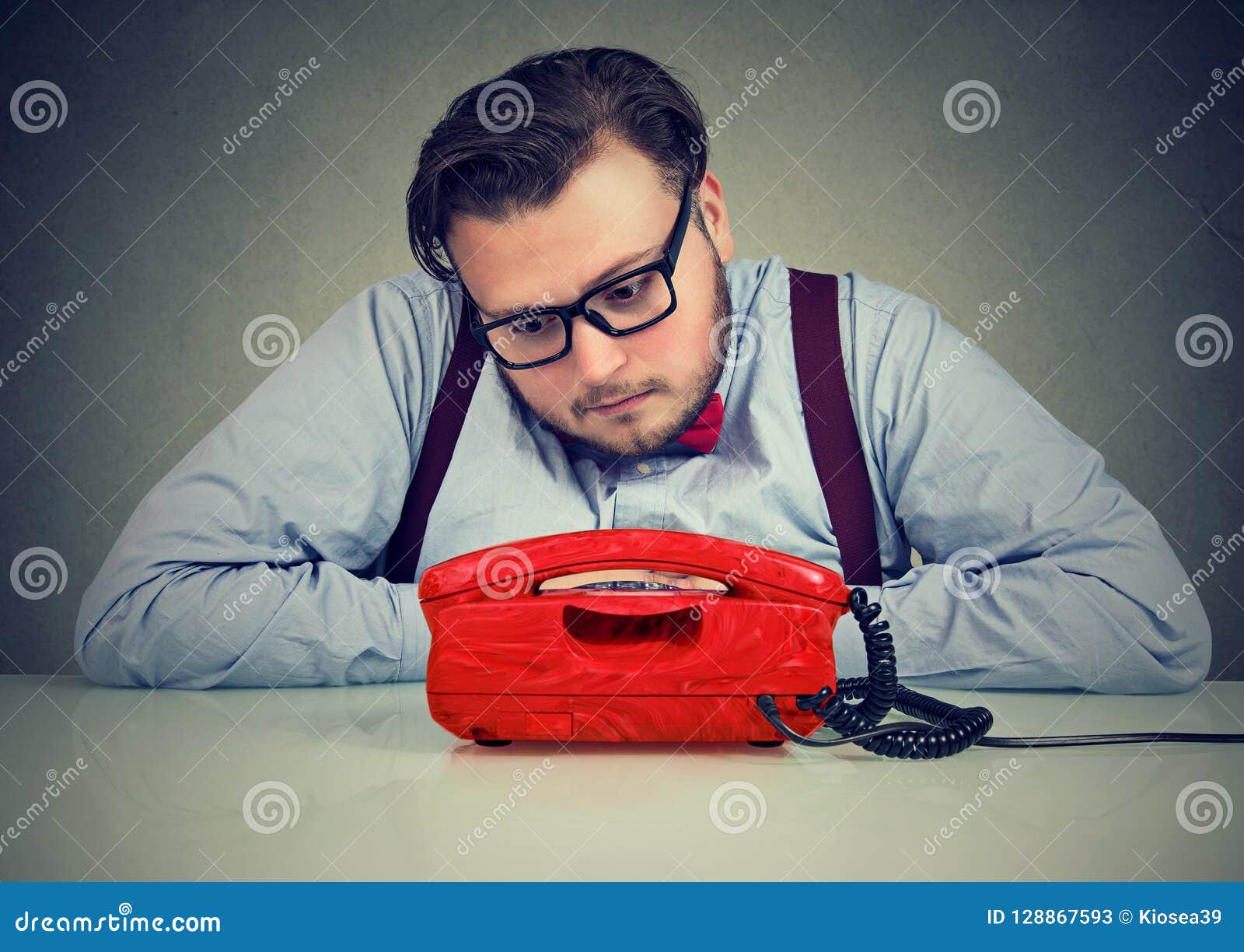 Desperate Sad Man Waiting for Someone To Call Him Stock Image - Image ...