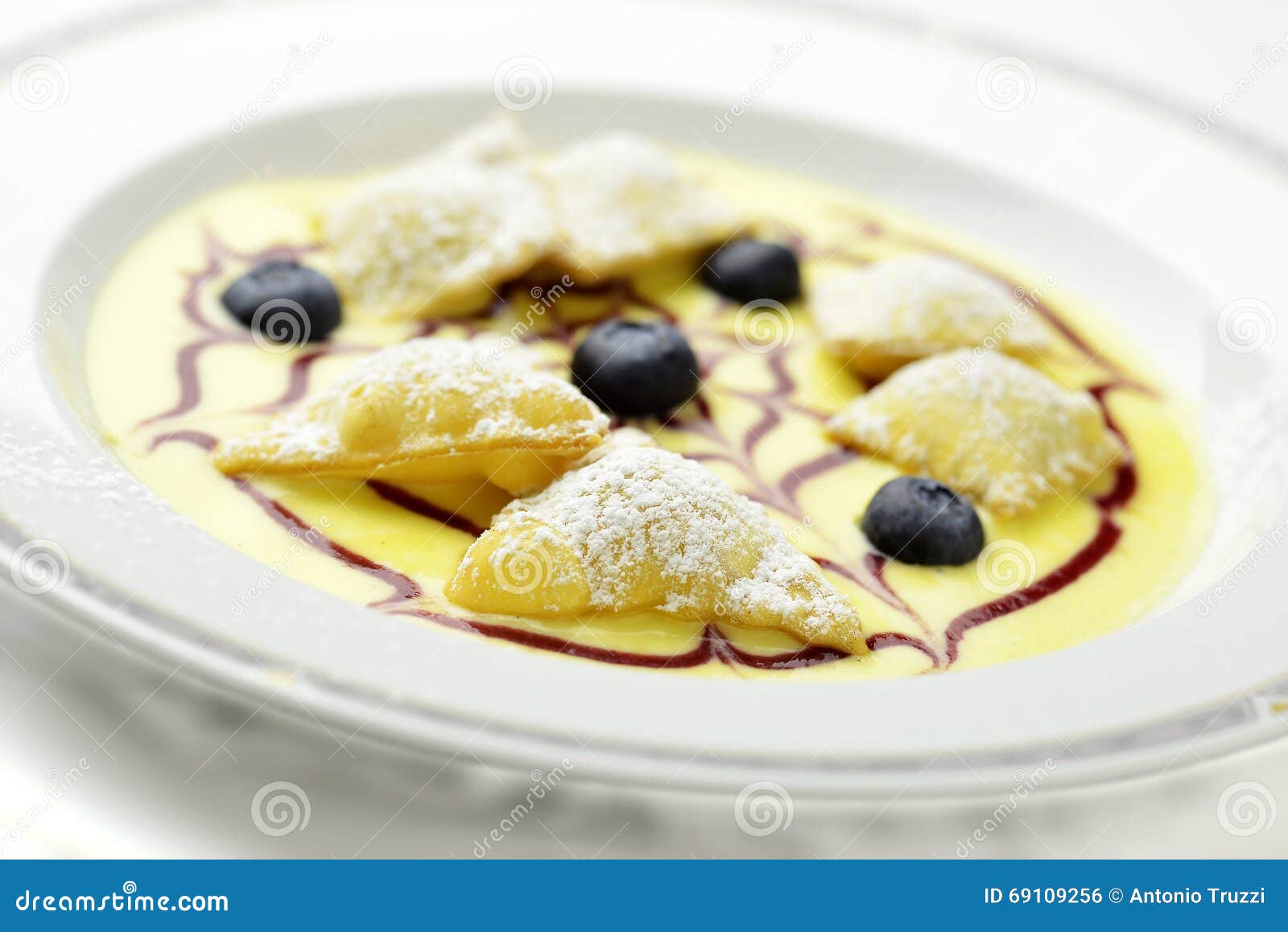 Dessert Fruit Ravioli on English Custard Stock Photo - Image of pudding ...