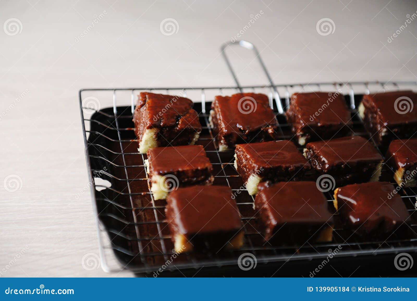 Dessert Lamington with Chocolate Icing on Baking Tray with Grill Stock ...