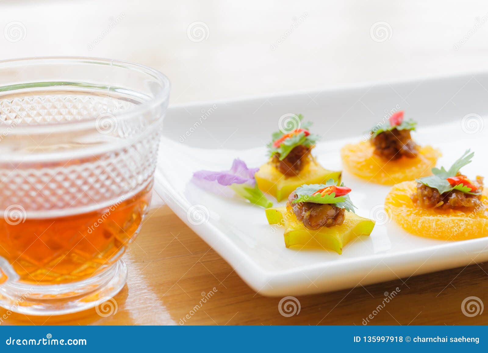 Dessert Name is ` MA HOR ` on the Dish and they are on the Table Stock ...