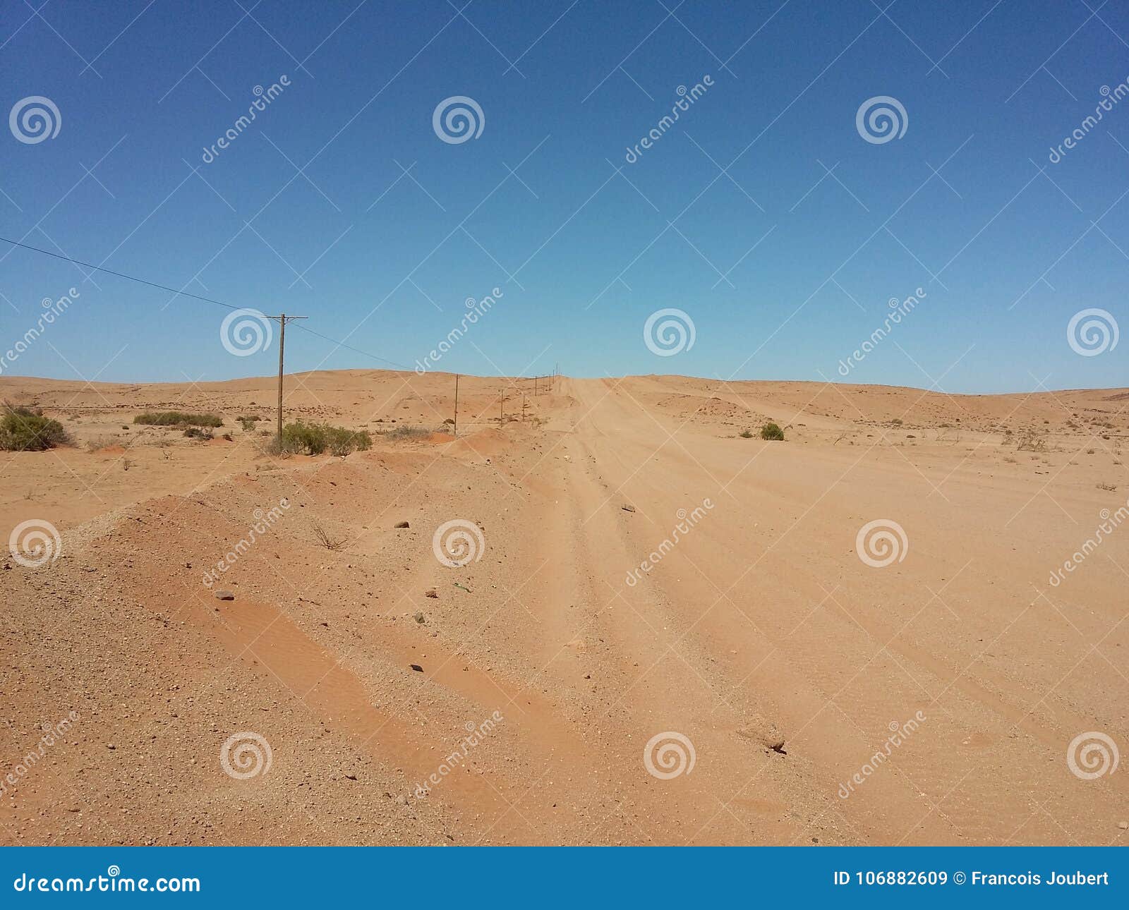 Dessert stock image. Image of sand, scene, dunes, road - 106882609