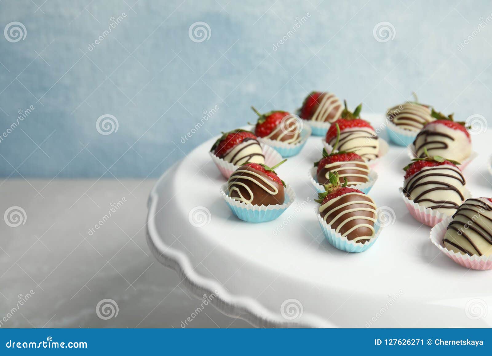 Dessert Stand with Chocolate Covered Strawberries on Table Stock Image ...