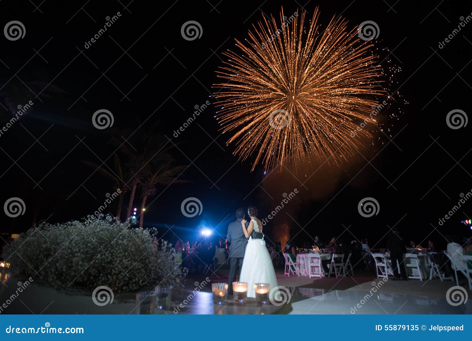 Destination Beach Wedding Fireworks Couple Looking at Editorial Image ...