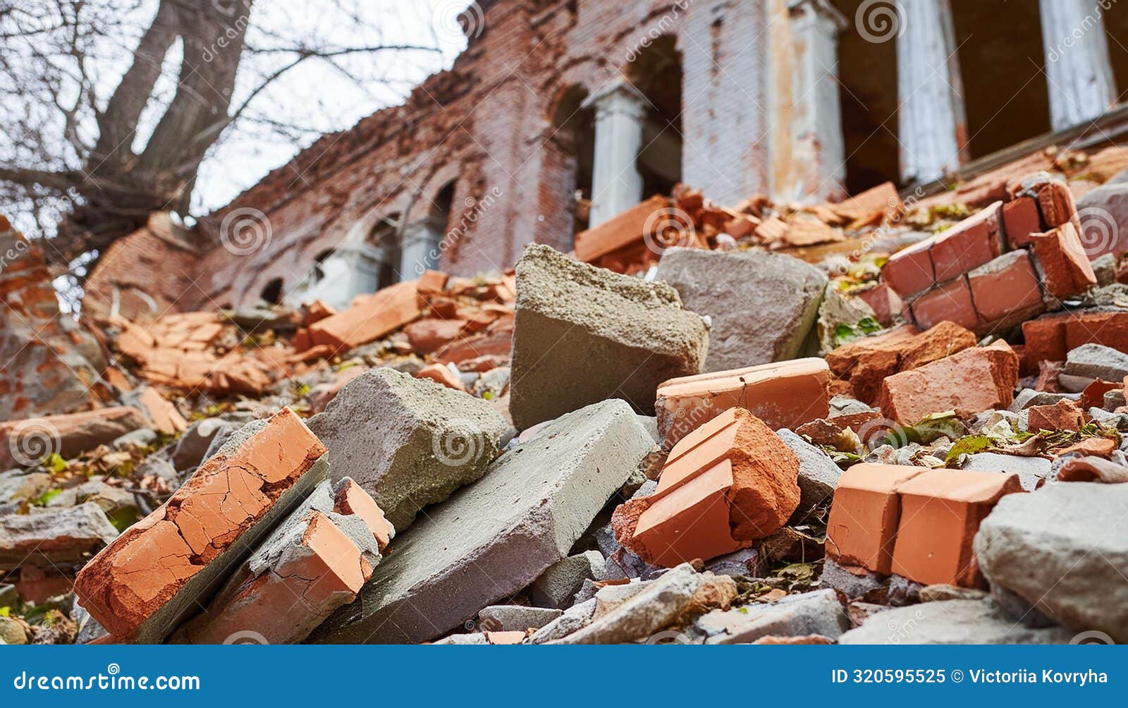 Destroyed Building, Wall with Bricks and Broken Pieces of Concrete ...