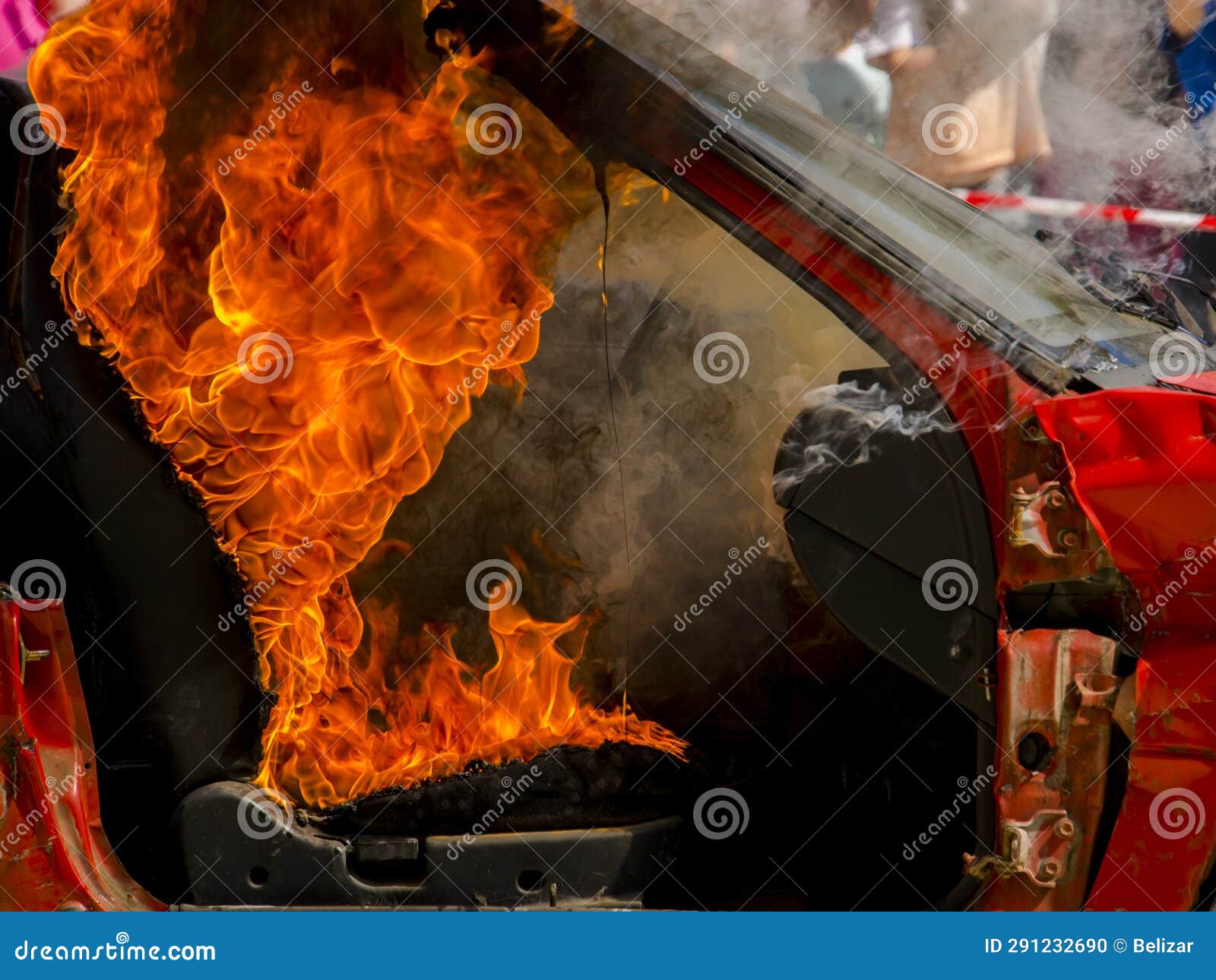 Destroyed Car on Fire in a Fire Service Show Stock Photo - Image of ...