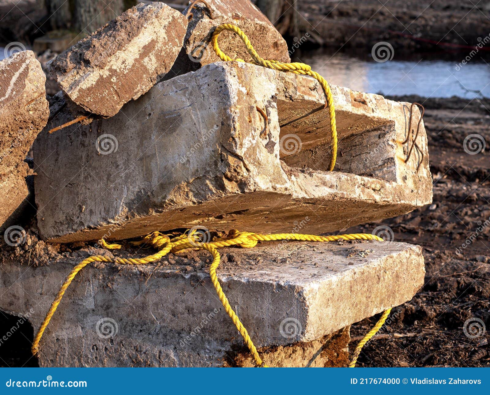 Destroyed Light Concrete Slabs, Tied with a Thick Yellow Rope, Cable ...