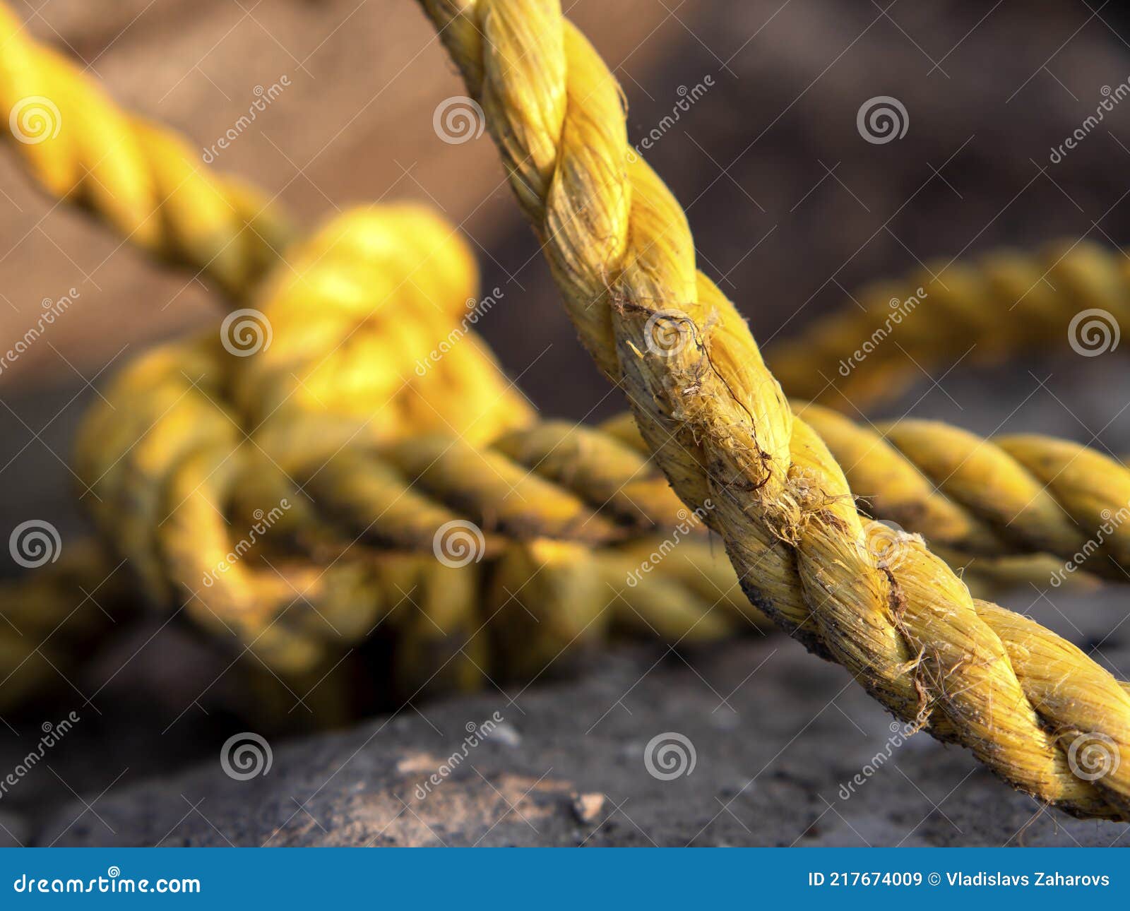 Destroyed Light Concrete Slabs, Tied with a Thick Yellow Rope, Cable ...