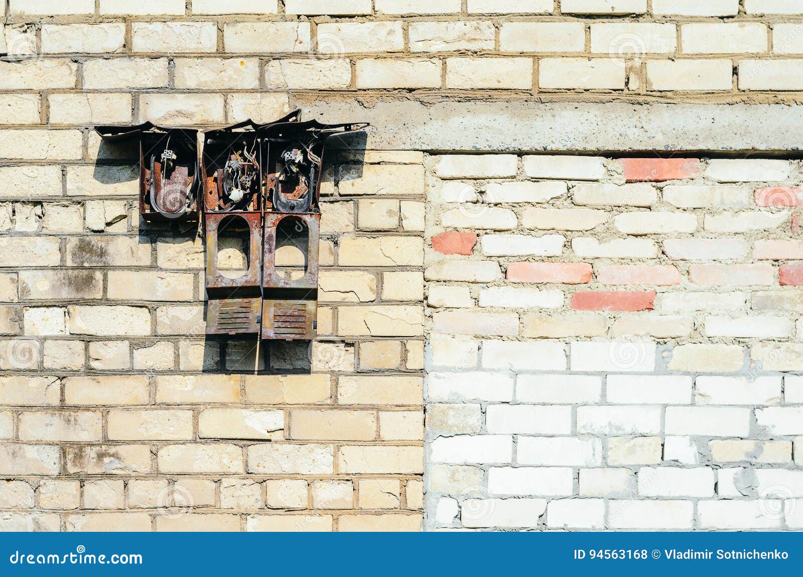 Destroyed Old Alarm System on the Old Brick Facade Stock Photo - Image ...