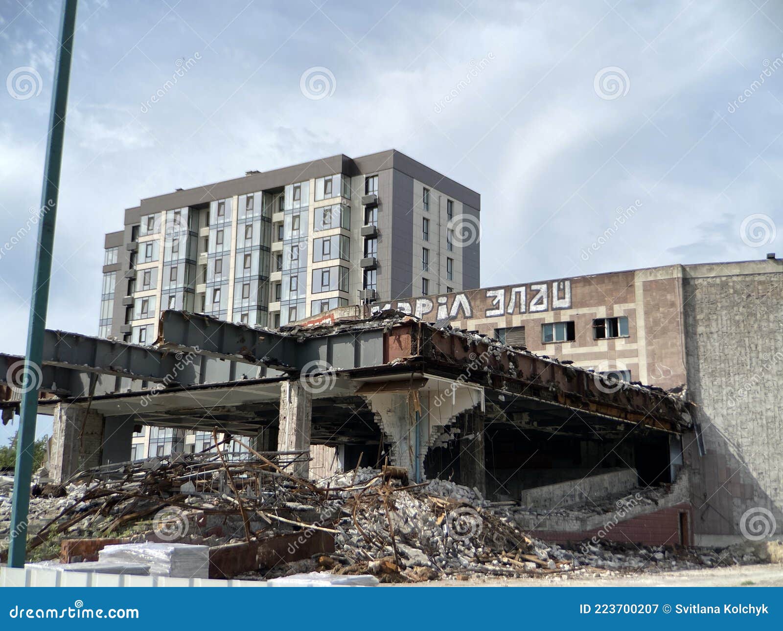 Destroyed Old Building on the Background of a Modern Skyscraper Stock ...