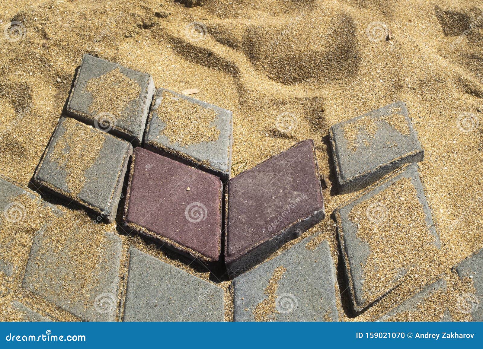 Destroyed Path of Paving Stone on a Sandy Base Stock Photo - Image of ...