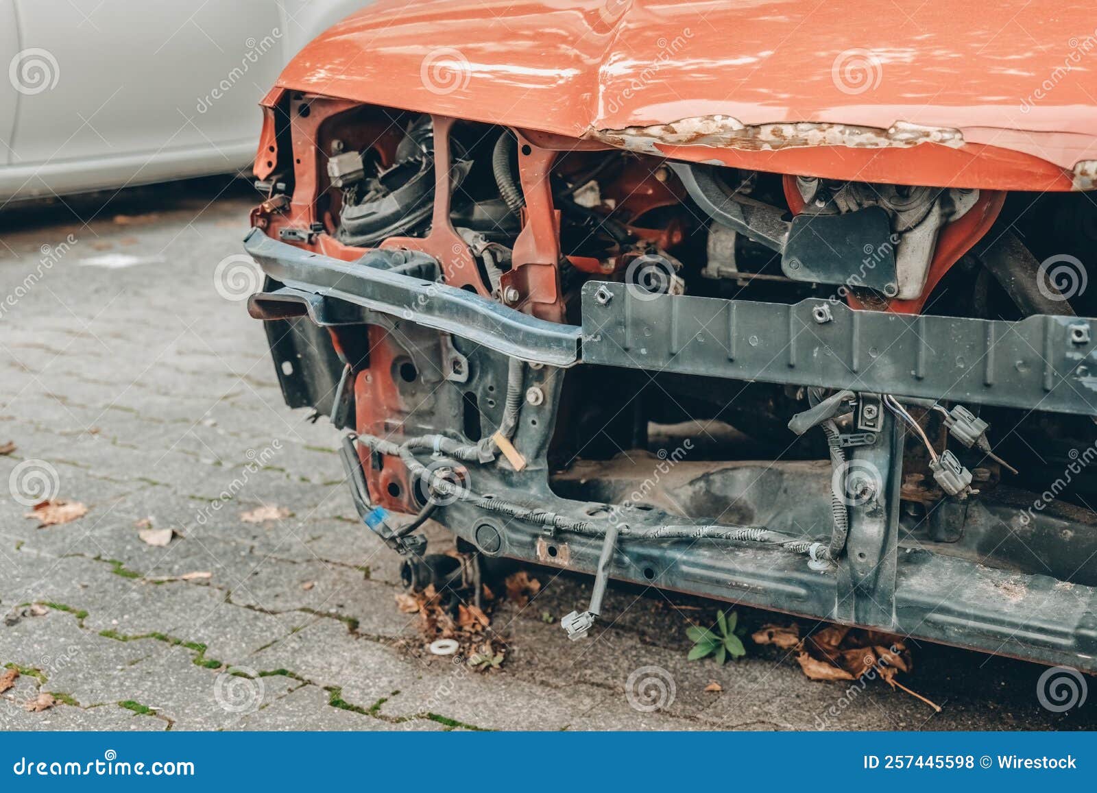 A Destroyed Car Wreck in a Parking Lot Stock Photo - Image of outside ...