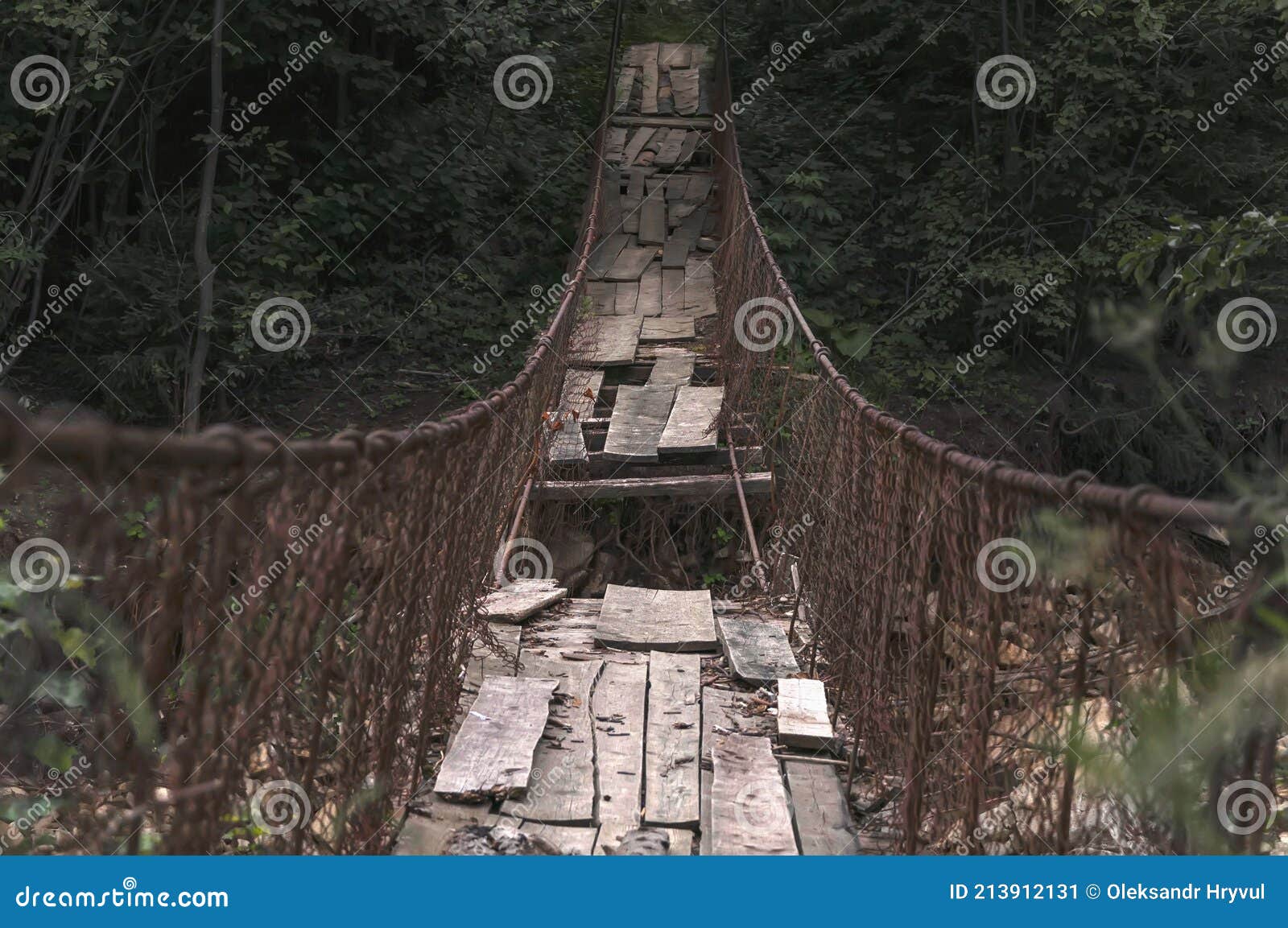 Destroyed Suspension Bridge Over a Mountain River Concept: Dangerous ...
