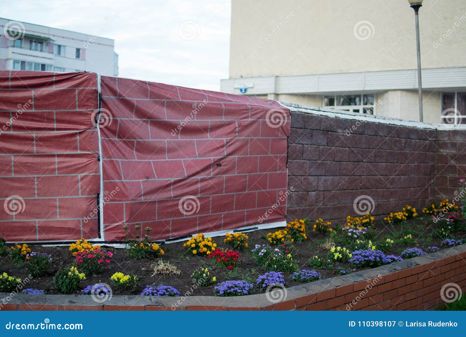 The Destroyed Wall is Closed by a Printed Image. Stock Image - Image of ...
