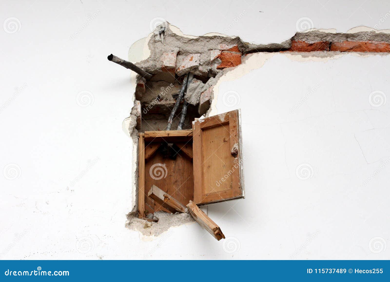 Destroyed Wooden Electrical Box with Wires Hanging from Wall Stock ...