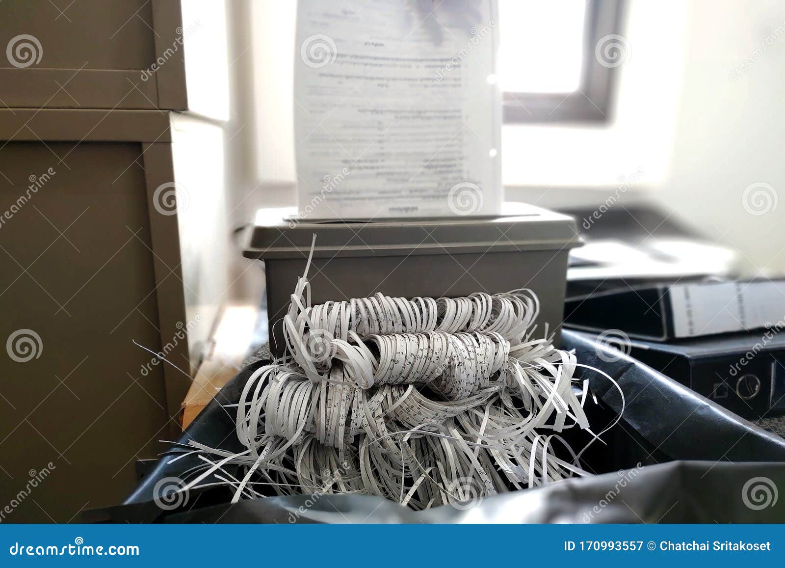 Destroying Documents with Document Shredder Machine Stock Image - Image ...