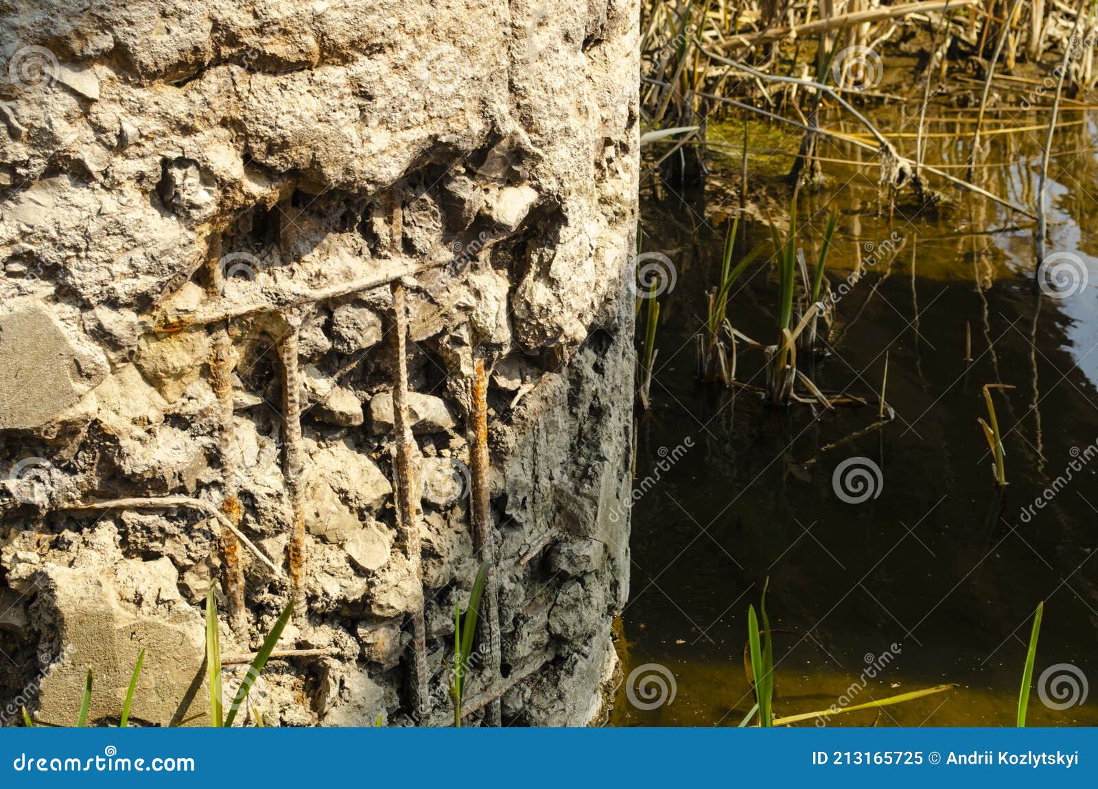 Destruction Of The Reinforced Concrete Column Of The Bridge. Bridge ...