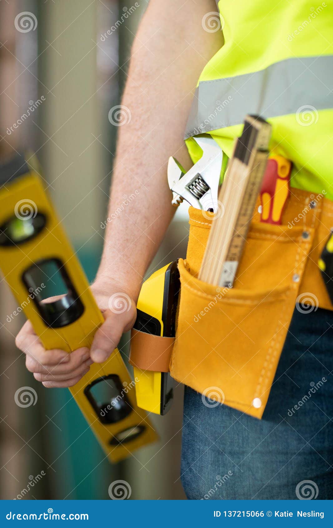 Detail of Construction Worker on Building Site Wearing Tool Belt Stock ...