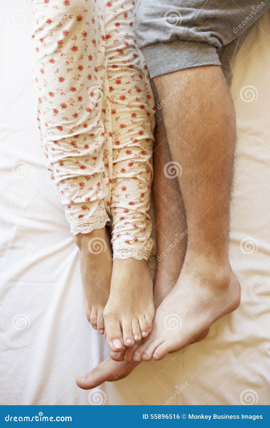 Detail of Couple S Legs Relaxing in Bed Stock Photo - Image of ...