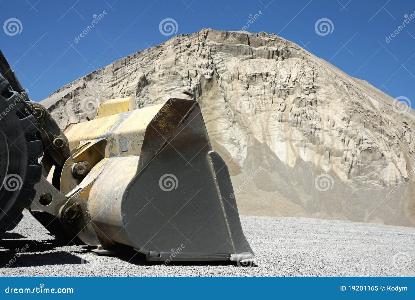 Detail of Dipper Bucket Under Big Hil of Sand Stock Image - Image of ...
