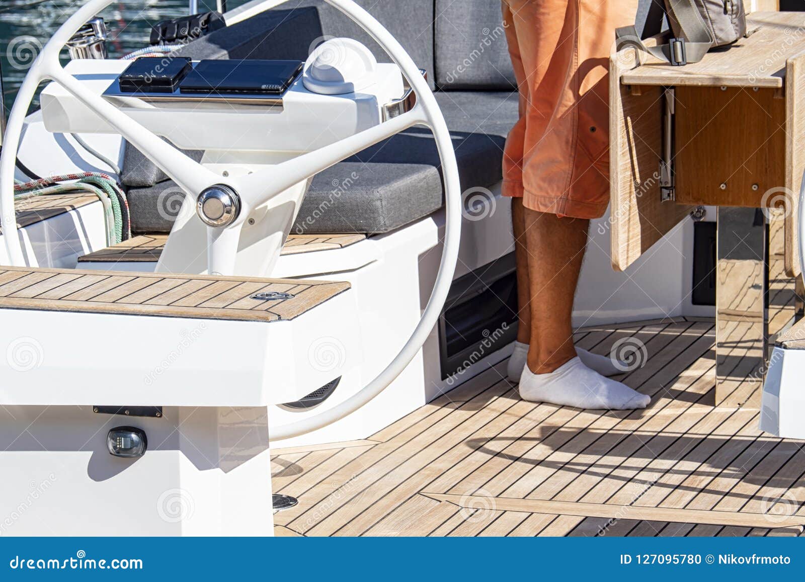 Feet on a boat deck stock photo. Image of sailboat, person - 127095780