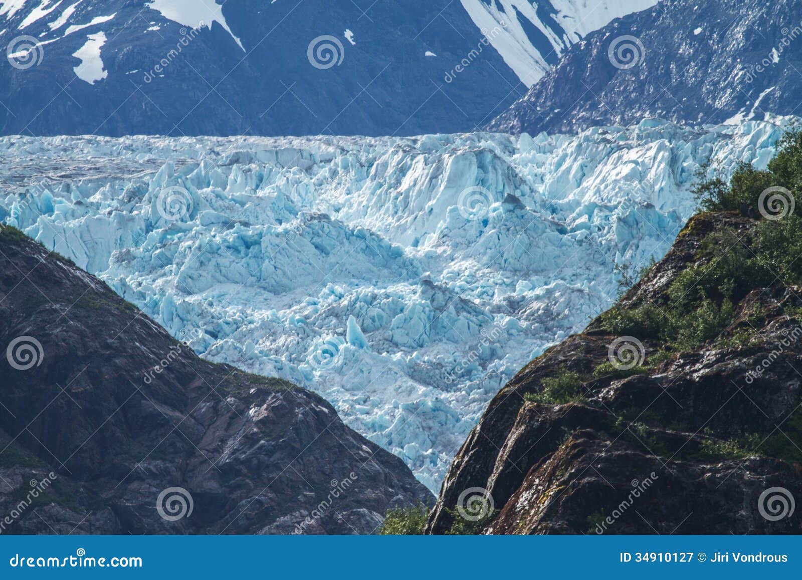 Detail of Glacier in Alaska Behind the Rocks. Stock Image - Image of ...
