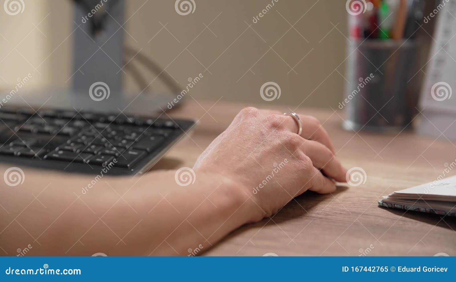 Detail on a Hand Controlling a Computer Using a Keyboard and a Mouse ... Detail on a Hand Controlling a Computer Using a Keyboard and a Mouse ...