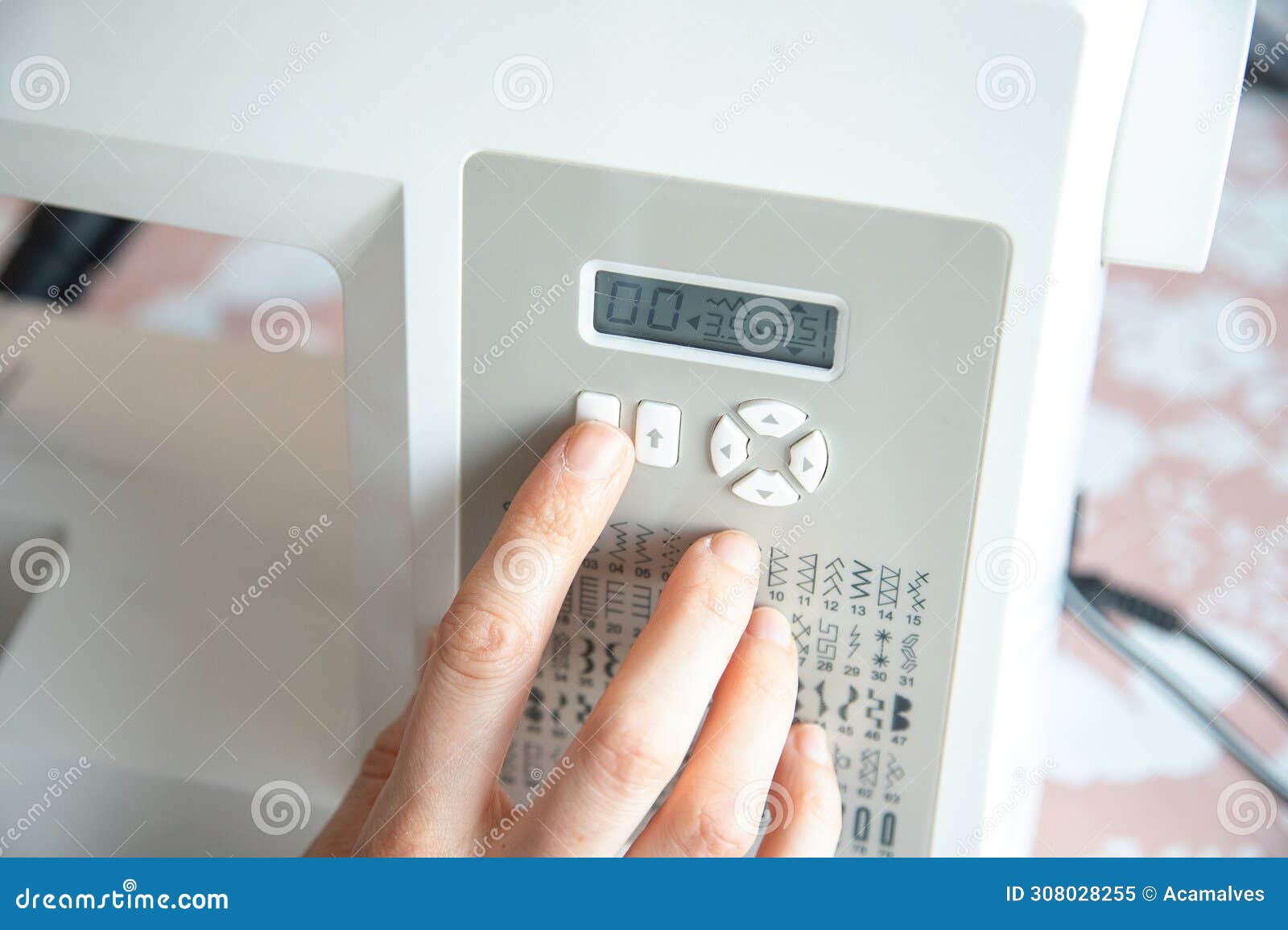 Detail of a Hand Pressing the Button To Select a Stitch for Machine ...