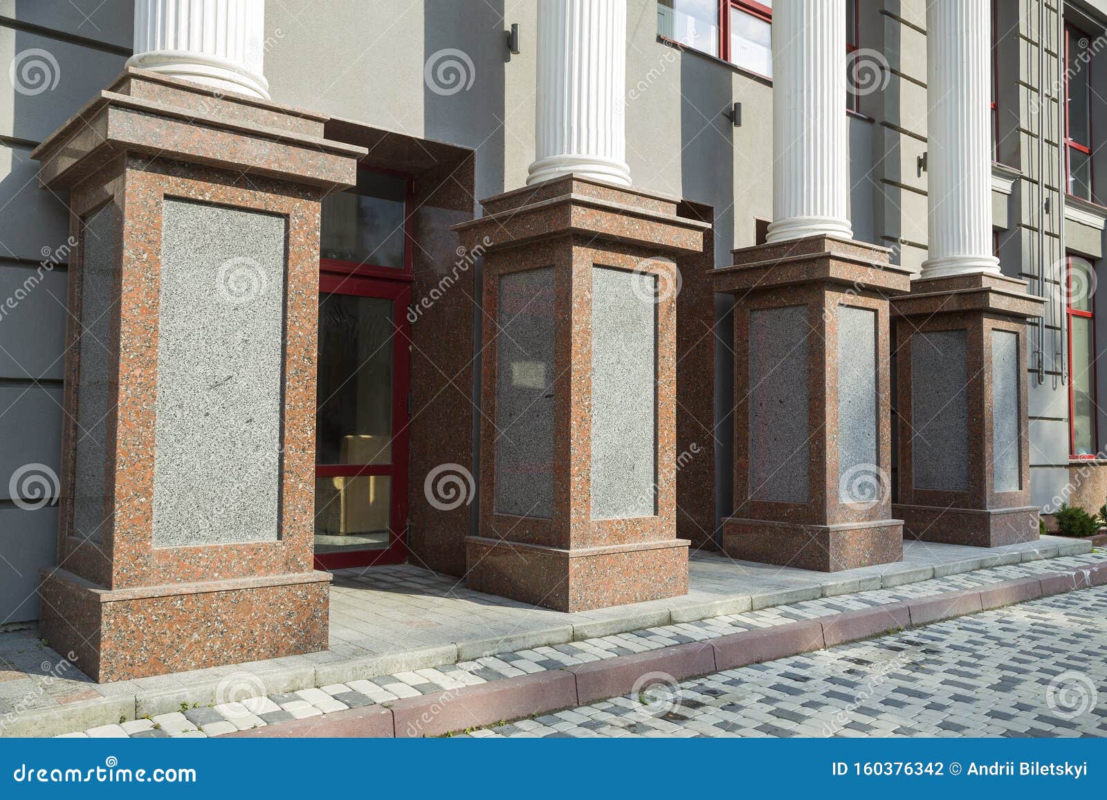 Detail of a House Facade. Granite Columns As Decorative Elements of the ...