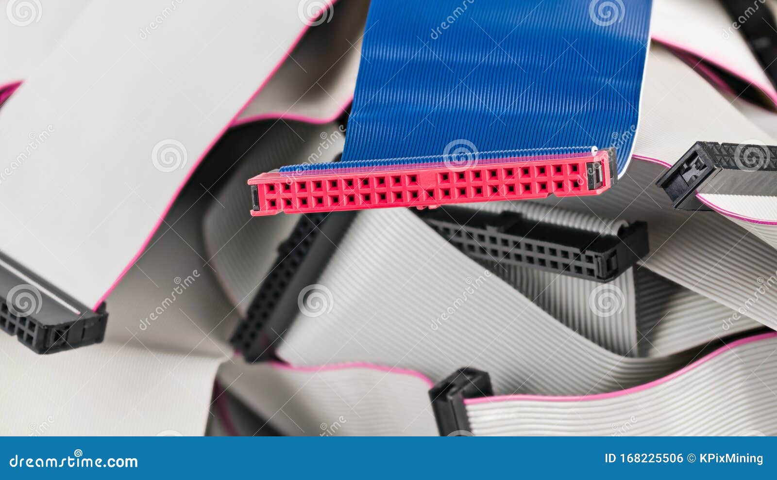 Blue Parallel Multi Wire Ribbon Cable with Pink Connector on Pile of ...