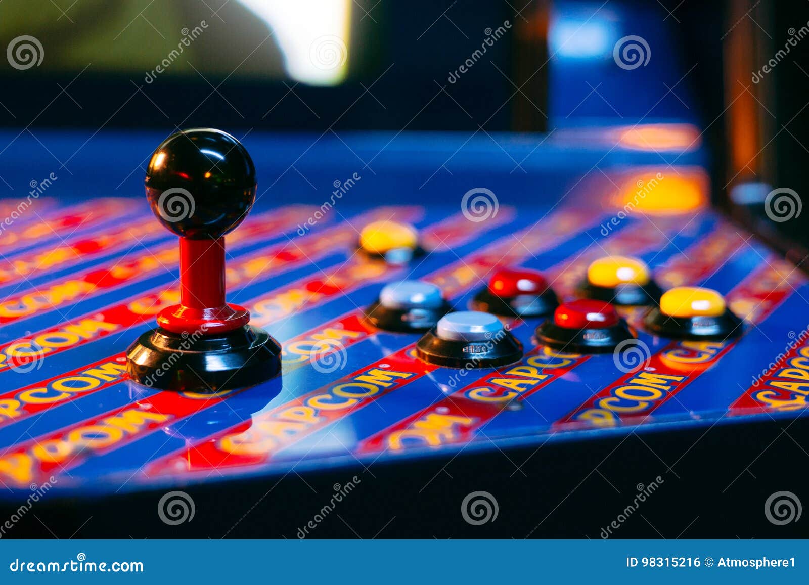 Detail on a Joystick and Six Button Controls of a Blue Arcade Game ...