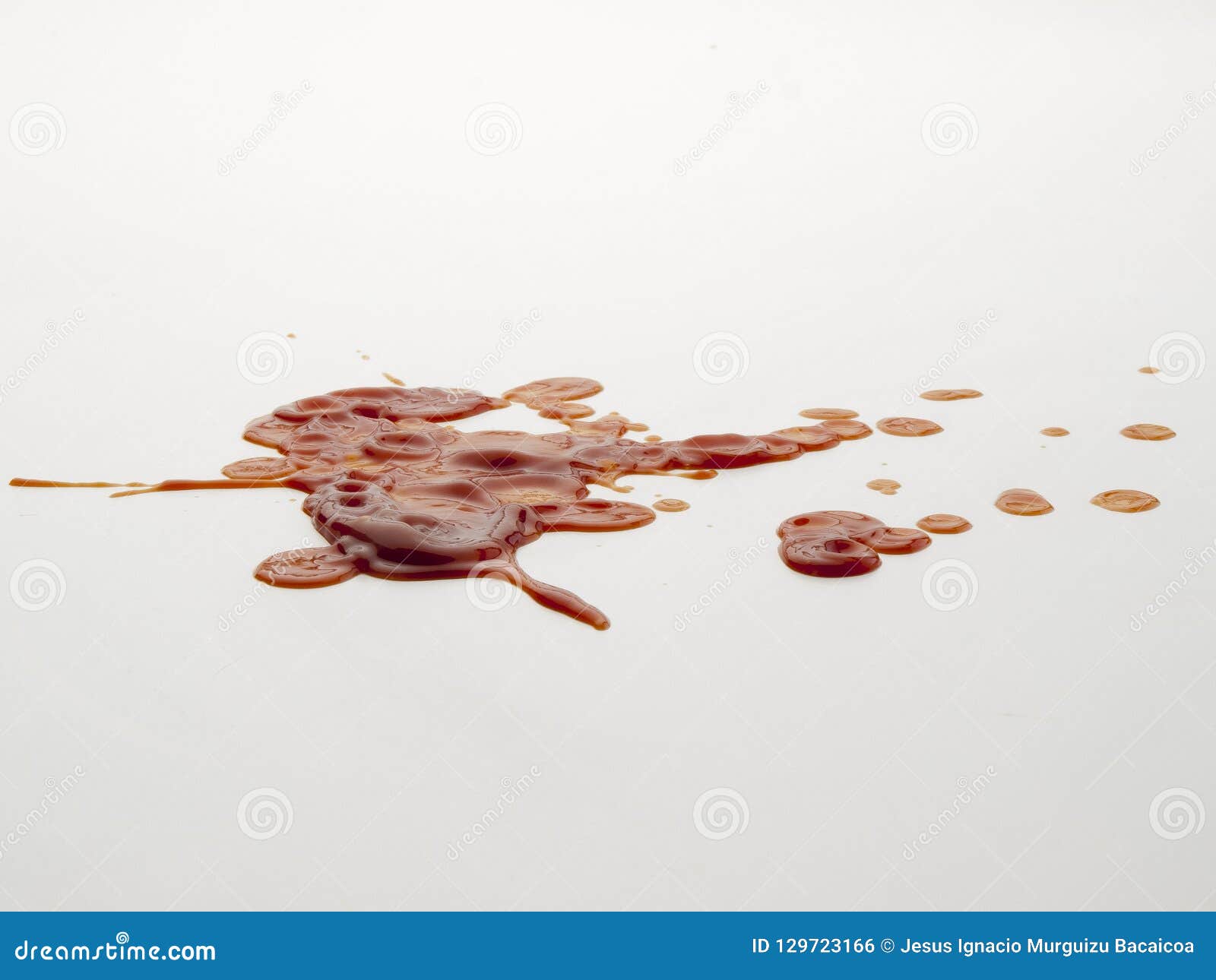 Detail of a Liquid Tomato Splash on a White Table Stock Photo - Image ...