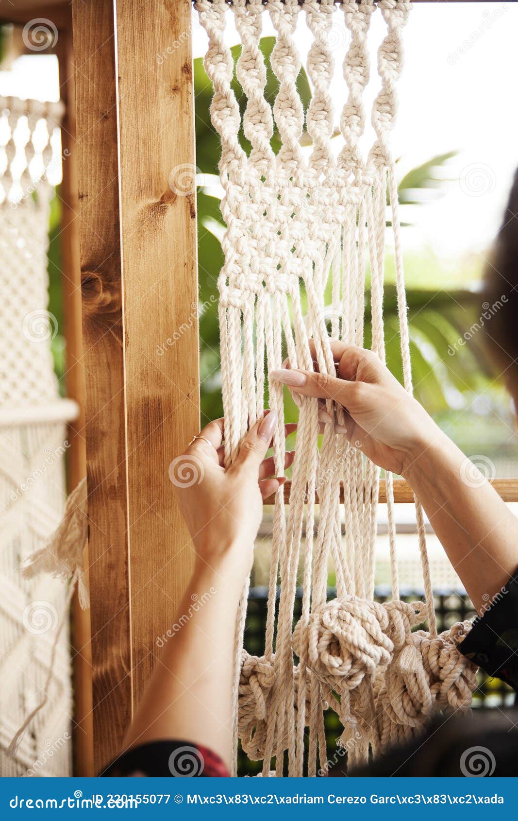 Detail of a Macrame Pattern and the Hands of a Girl Making Knots with ...
