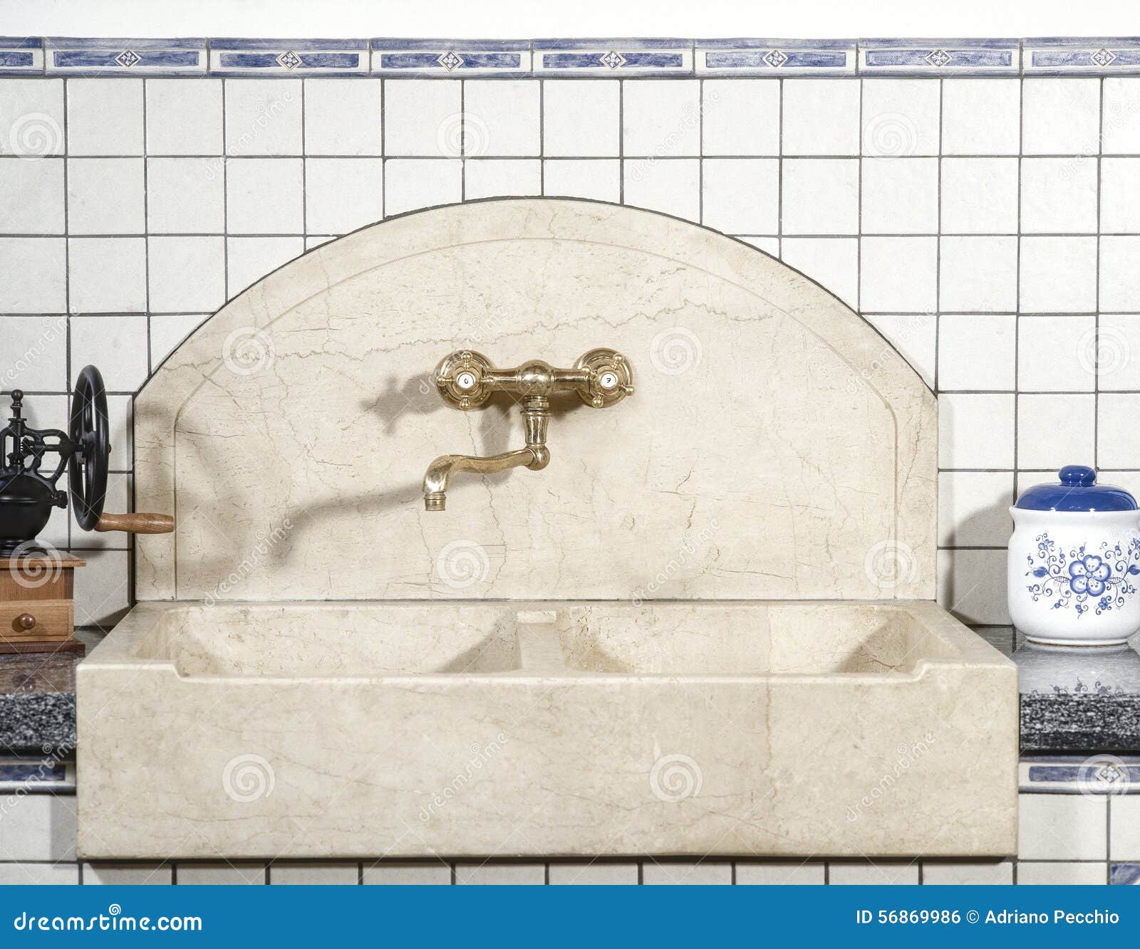 Marble Sink In A Public Restroom With Retro Golden Water Tap With ...