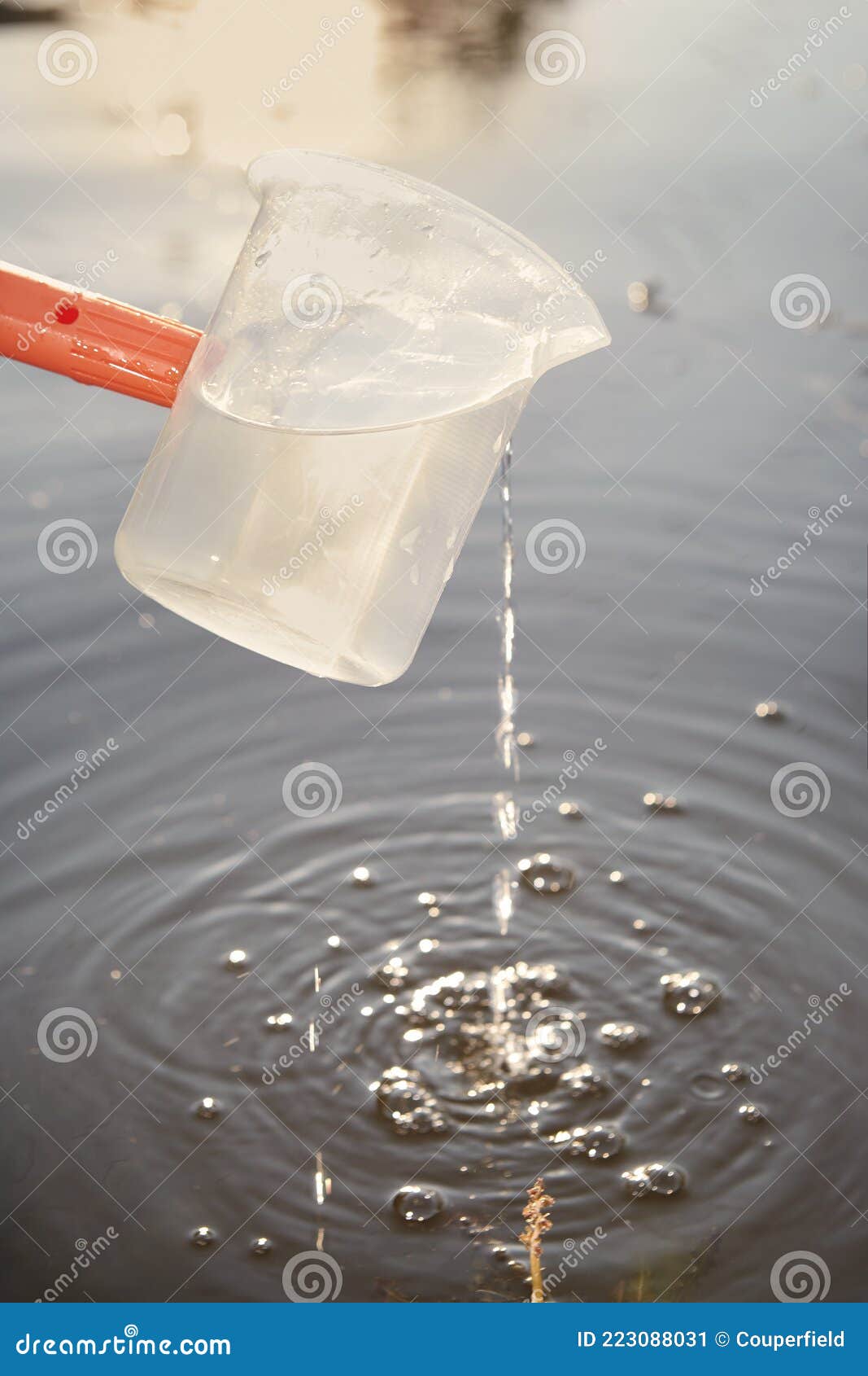Detail of Plastic Sampling Beaker on Rod with Sample of Water Stock ...