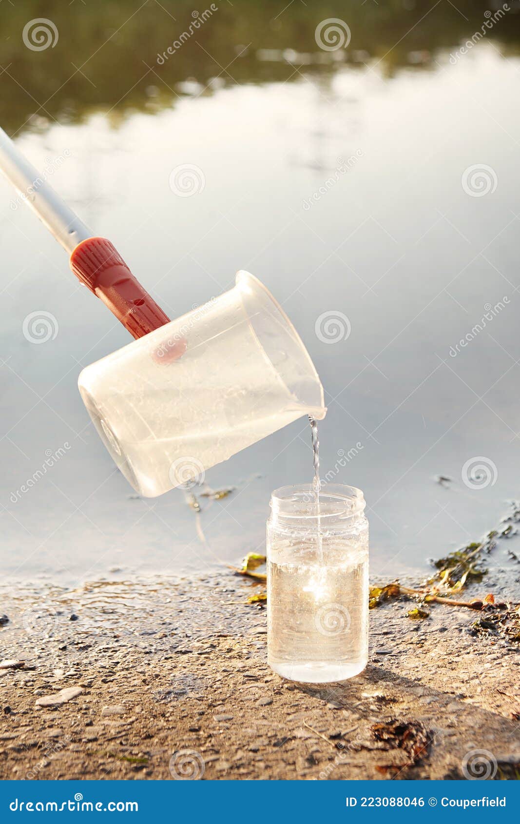 Detail of Plastic Sampling Beaker on Rod with Sample of Water Stock ...
