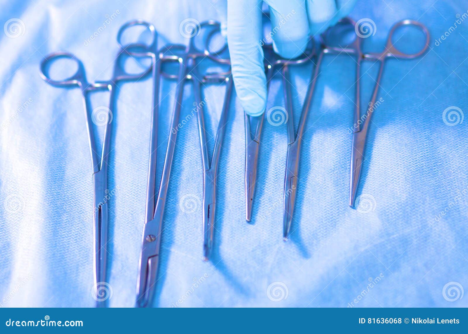 Detail Shot of Steralized Surgery Instruments with a Hand Grabbing Tool ...