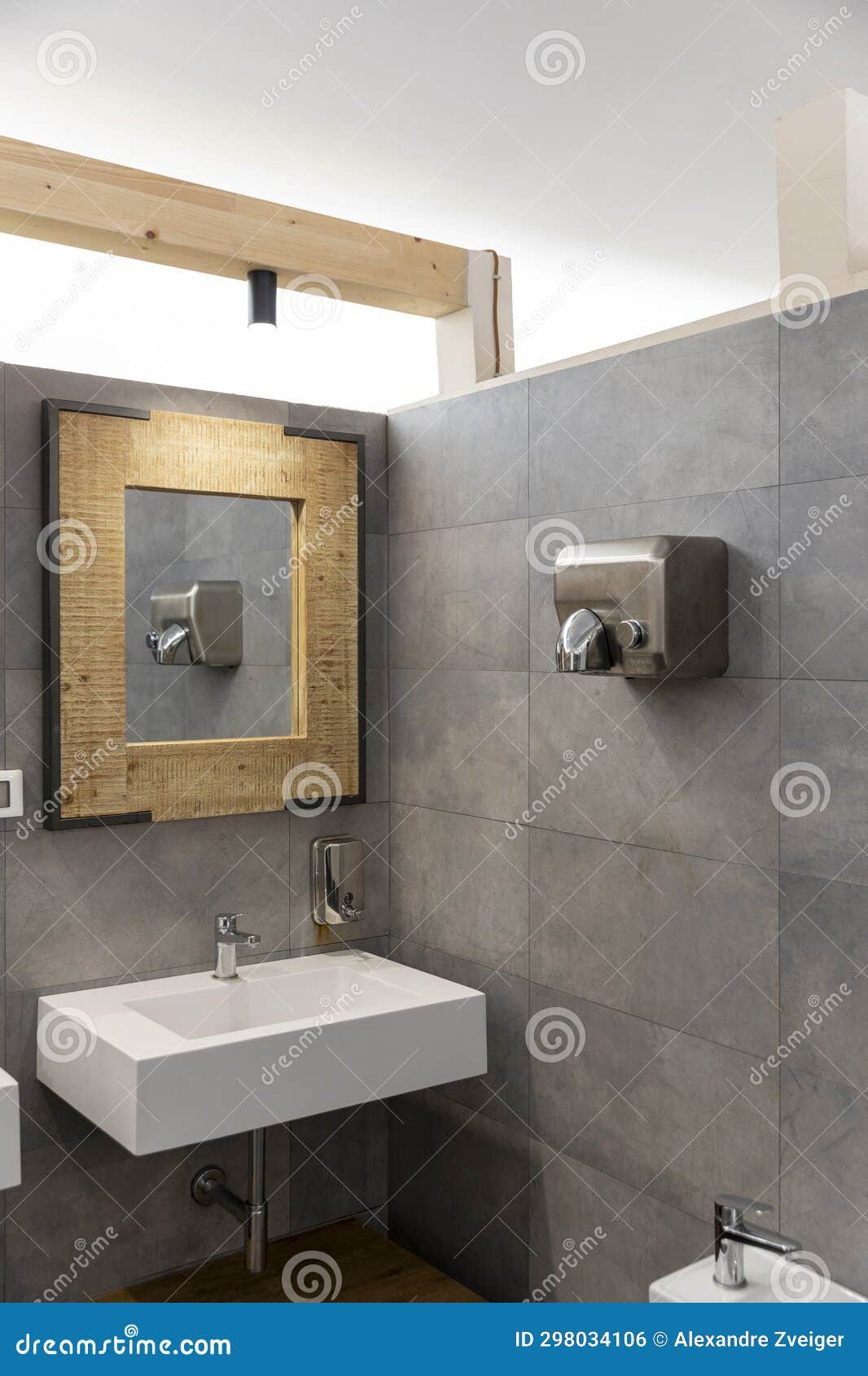 Detail of a Sink with a Wicker Mirror and a Hand Dryer Stock Photo ...