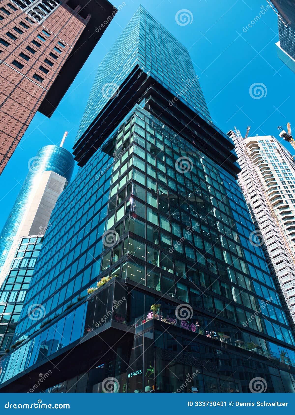 Detail of a Skyscraper with a Glass Front and an Architectural Feature ...