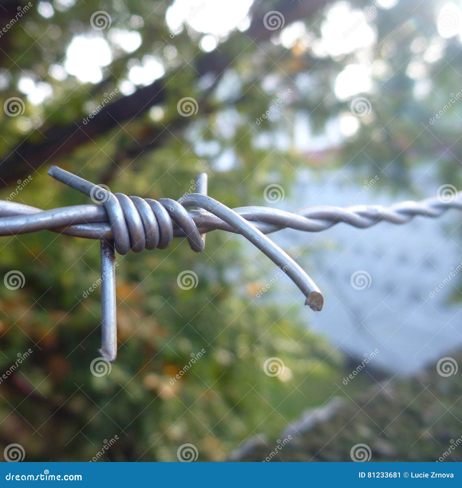 A Spiky Fence Illuminates The Rising Sun. Royalty-Free Stock Photo ...
