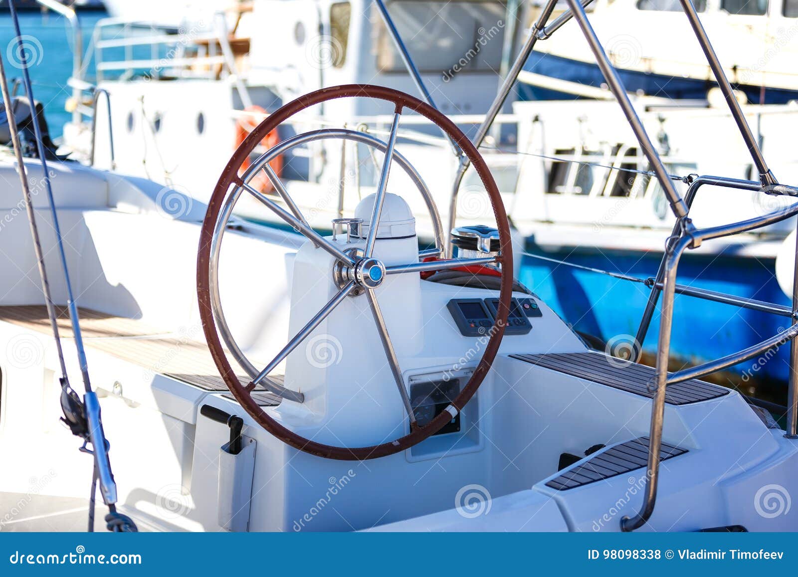 Detail of Steering Wheel and Navigation Instruments of a Sailboat. Blur ...
