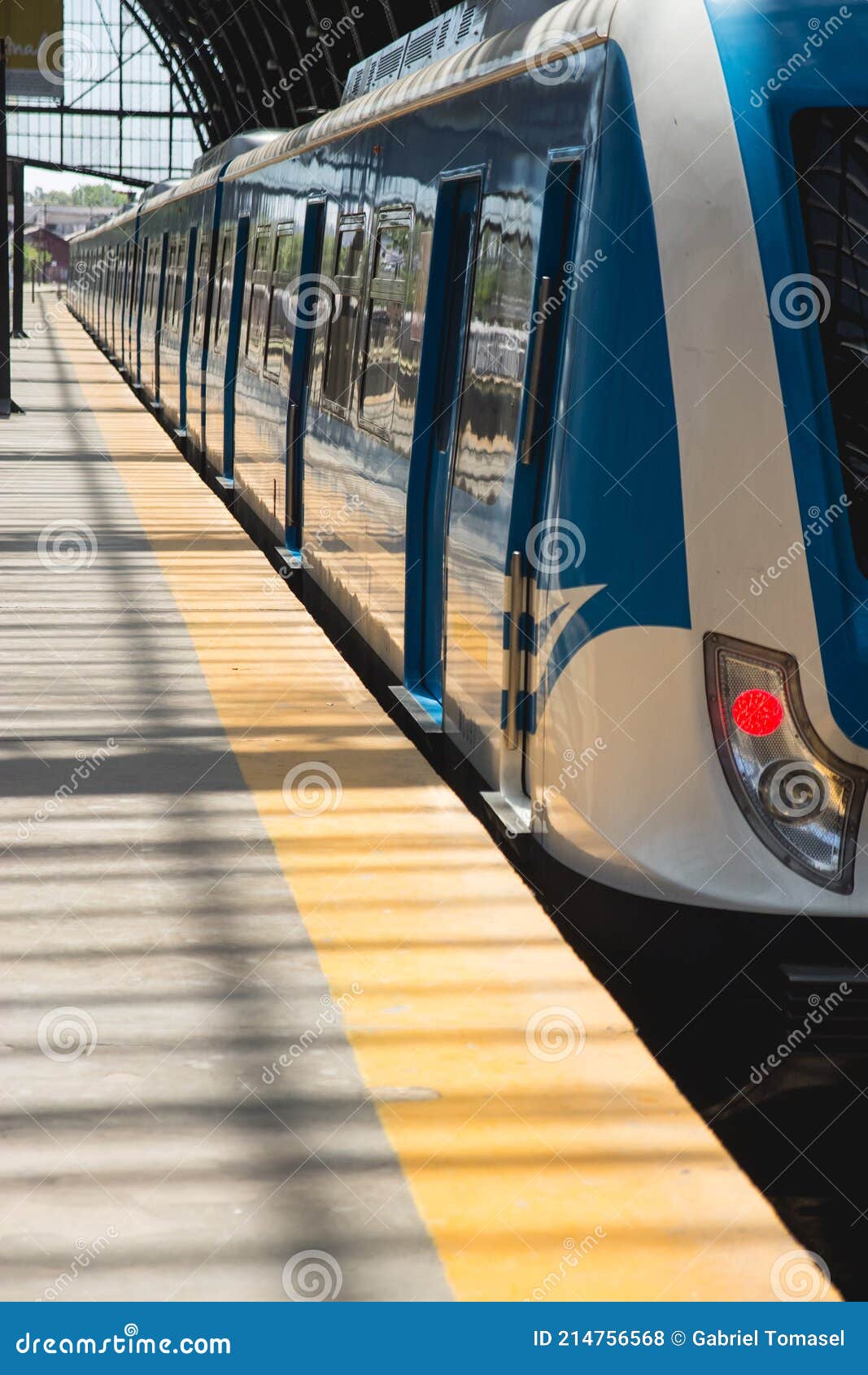 Detail of the Train Station Being Reflected in the Shiny Train Stock ...