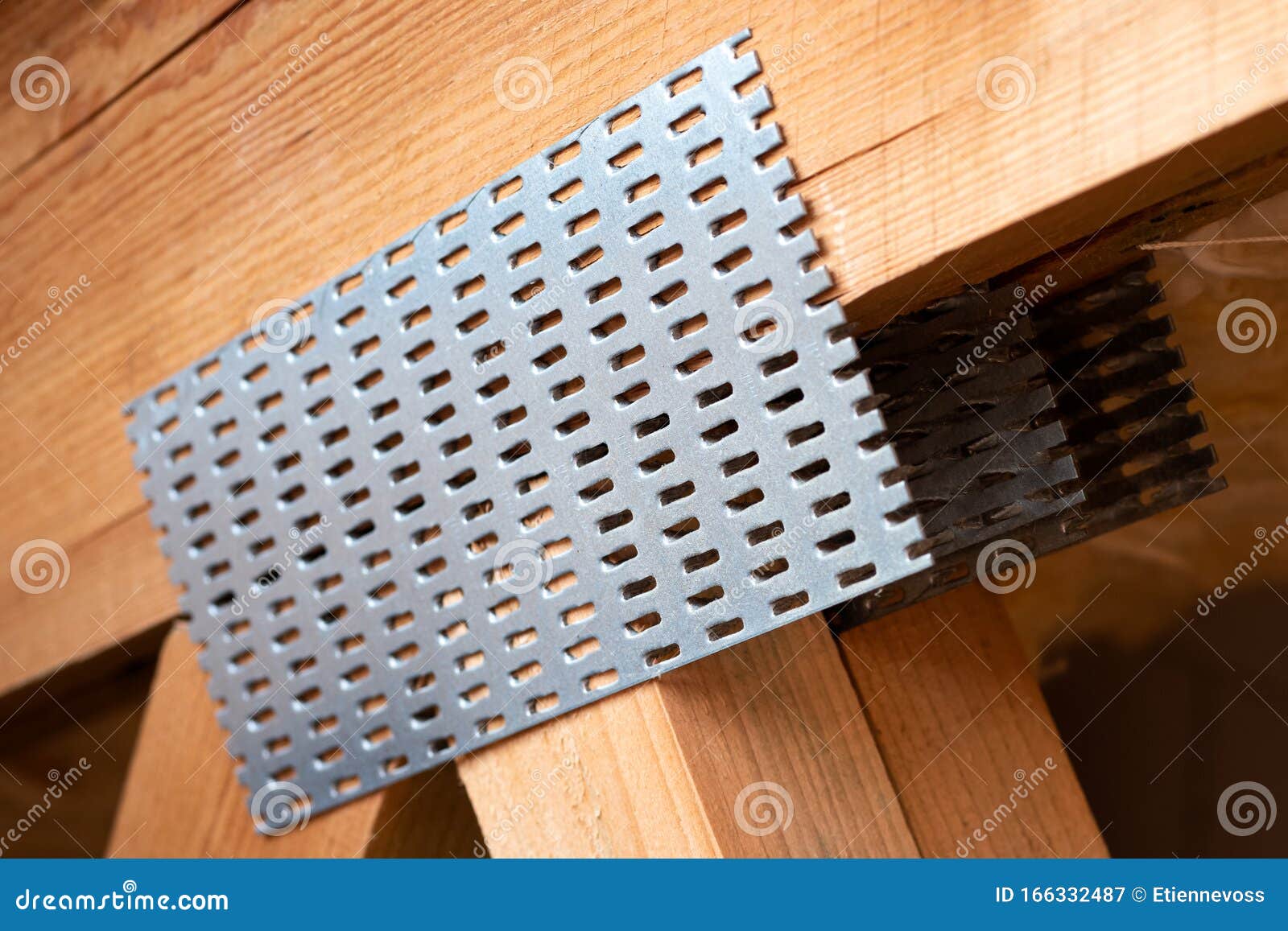 Two Galvanized Nail Plates Lying On Chip Board. Blurred Background ...