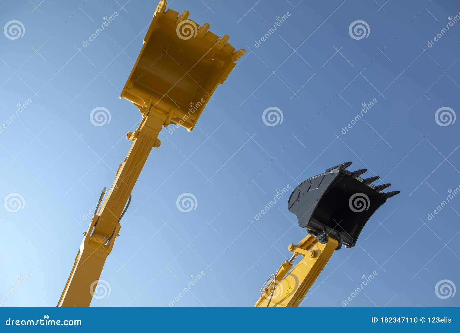Diggers on the blue sky stock photo. Image of excavator - 182347110