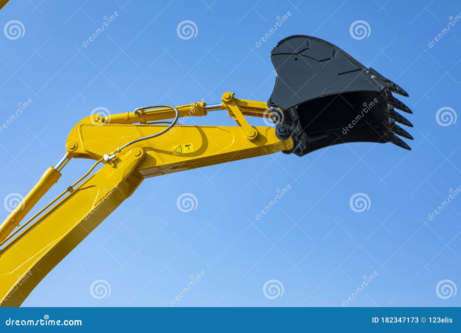 Diggers on the blue sky stock image. Image of machinery - 182347173