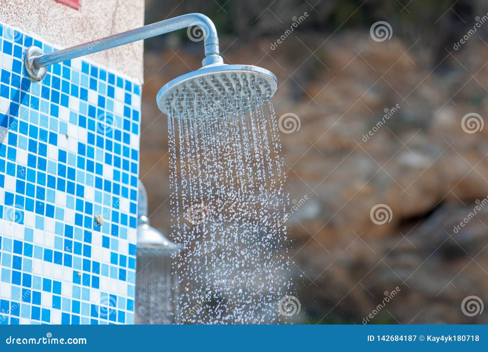 Detail of a Water Shower on the Beach in Horizontal Composition Stock ...